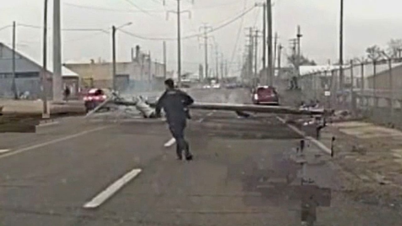Suspect crashes into utility poles during pursuit, causing massive ...