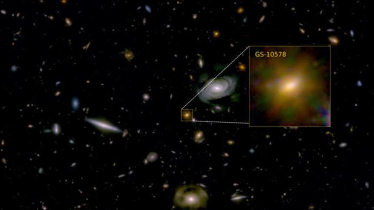 Giant galaxy died 12 billion years ago after its own black hole cut off ...
