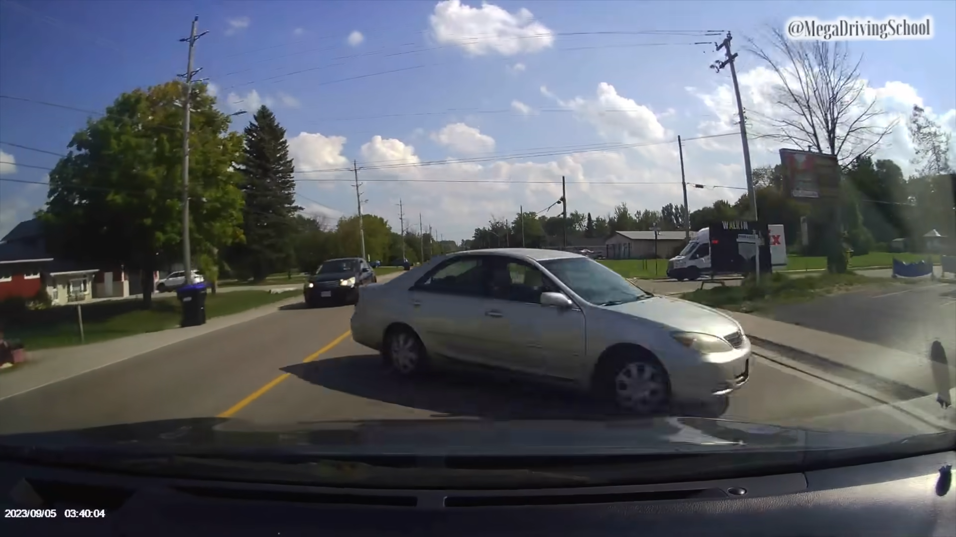 A left turn with no signal nearly causes a crash