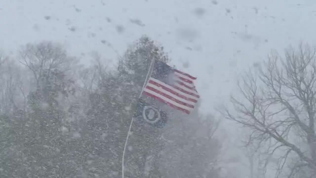 Sudden snow squall blankets quiet roads in New York, USA