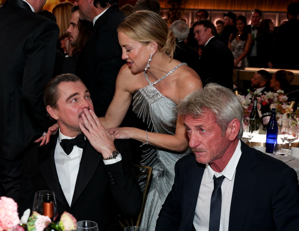 Sean Penn caught smoking at his table during the Golden Globes 2026