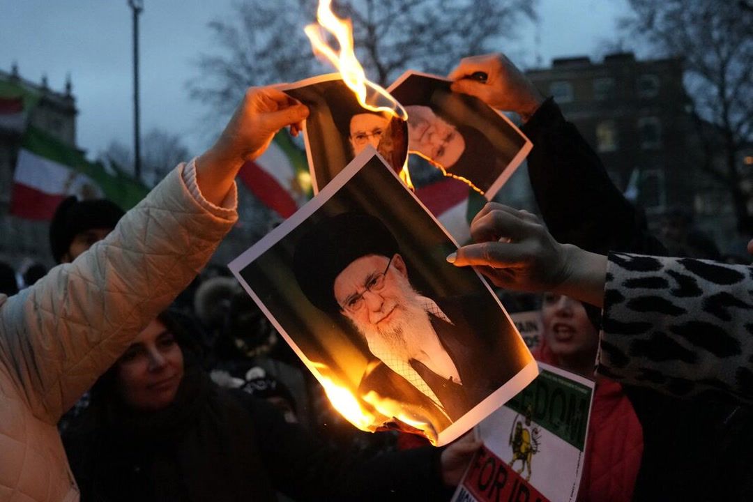 Iran protesters burn Khamenei portrait amid internet blackout