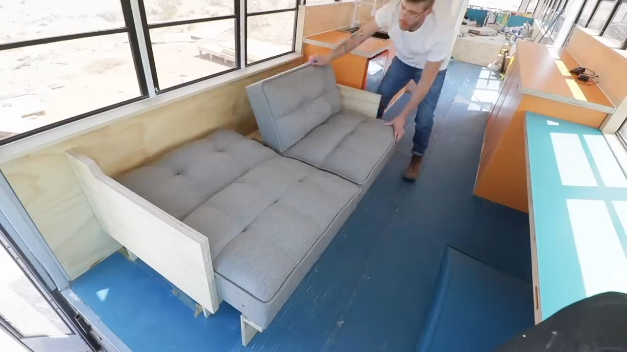 Building a modern living room in a school bus