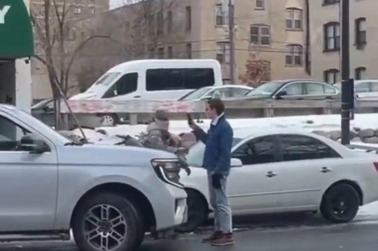 Shocking moment ICE agent shoves man to the ground on Minneapolis street