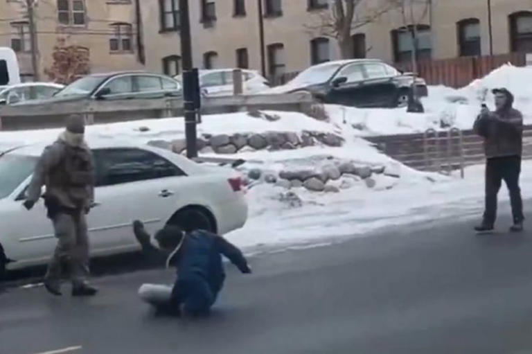 Shocking moment ICE agent shoves man to the ground on Minneapolis street