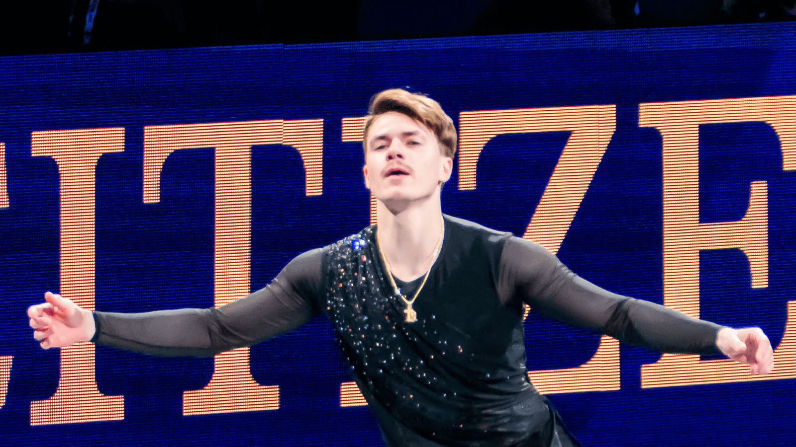 Figure skater breaks down in tears during tribute to parents one year ...