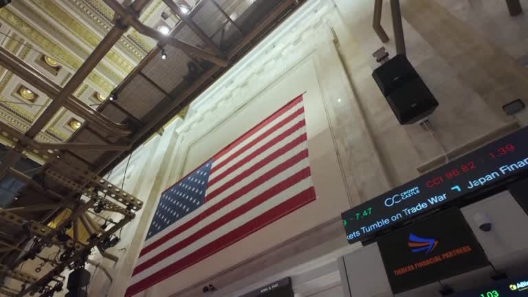 Dollar dips, gold at record high as US prosecutors target Fed's Powell