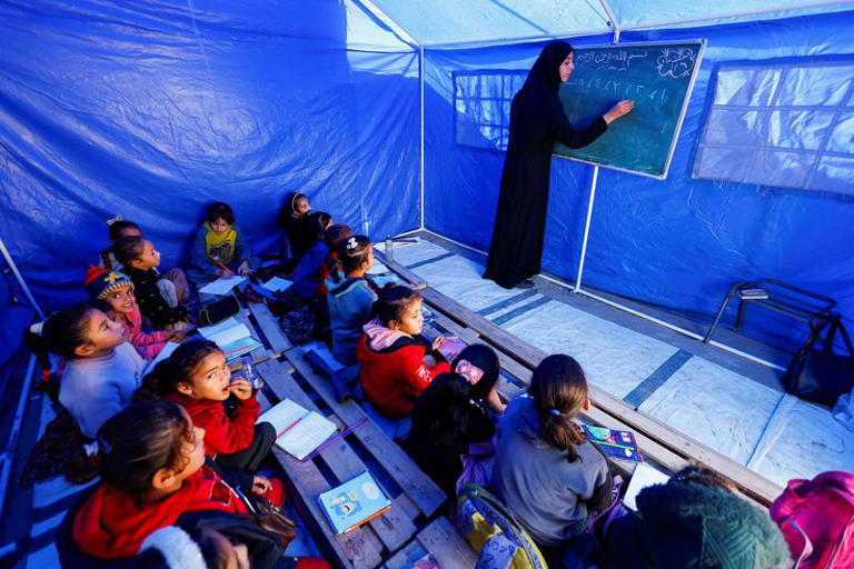 School resumes in tents under shadow of Gaza's 'yellow line'