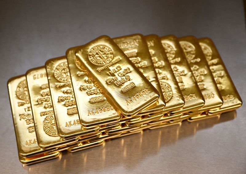 Gold leaps to record high, dollar drops as US prosecutors target Fed's ...