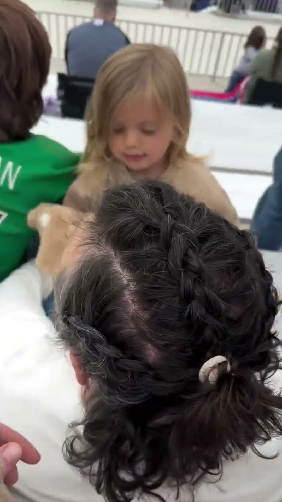 A fresh hairdo at football