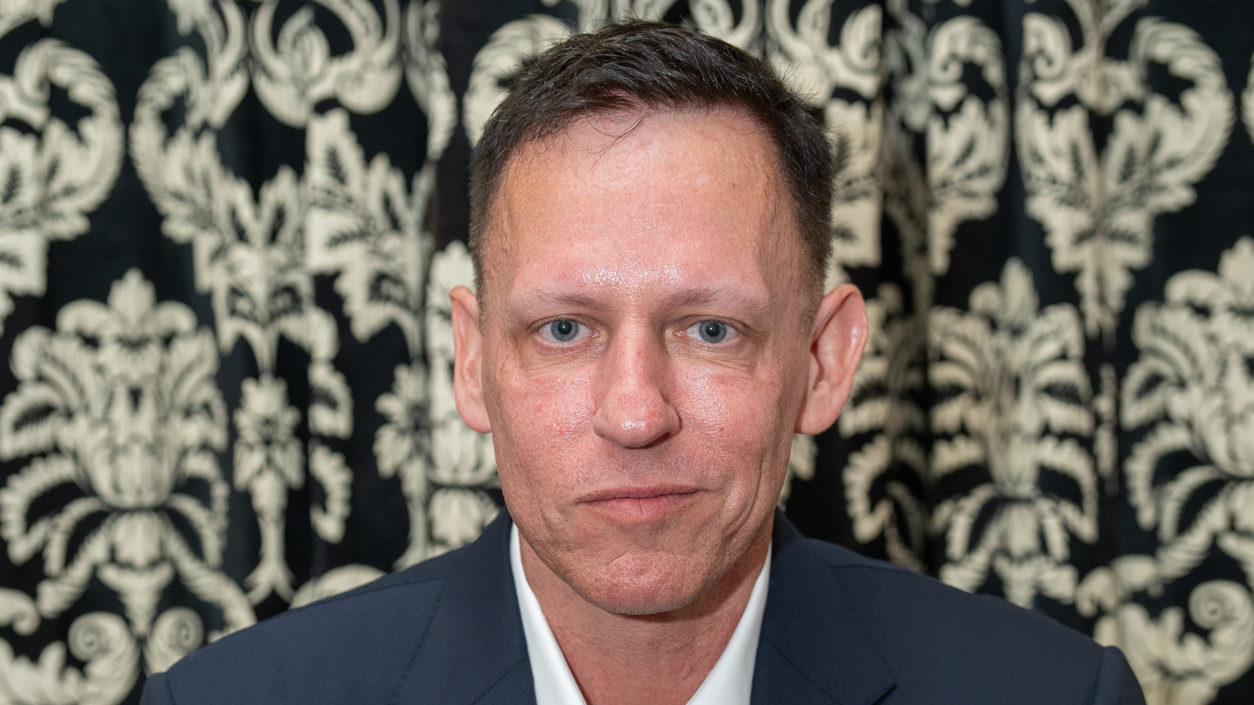 Trumpy billionaire spends millions to block tax on rich pals