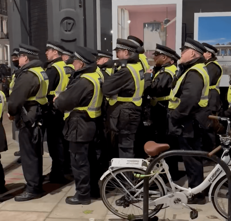 Police accused of 'standing by' while protesters target Israeli restaurant