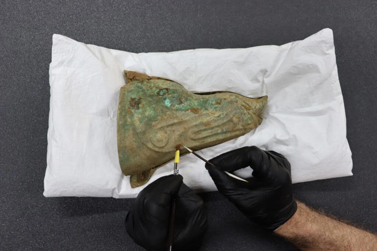 Archaeologists unearth a rare 2,000-year-old Iron Age war trumpet in ...