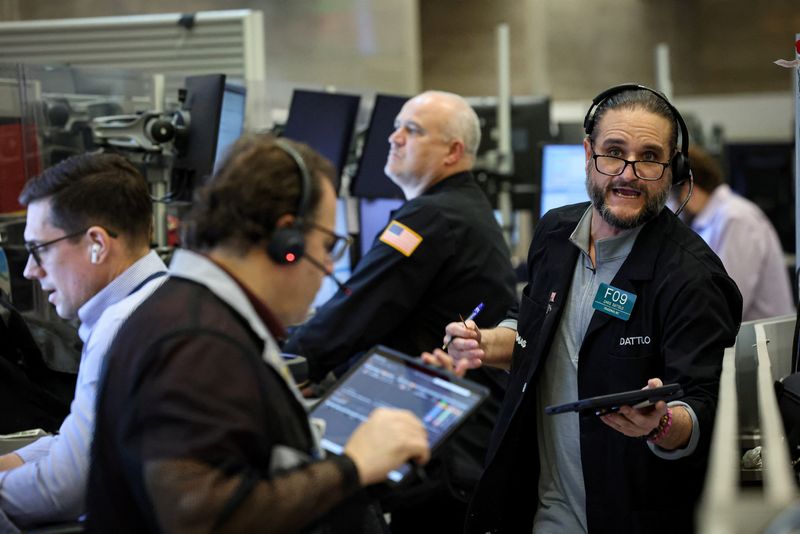 Wall Street wobbles, gold resurgent as Trump pursues central banker