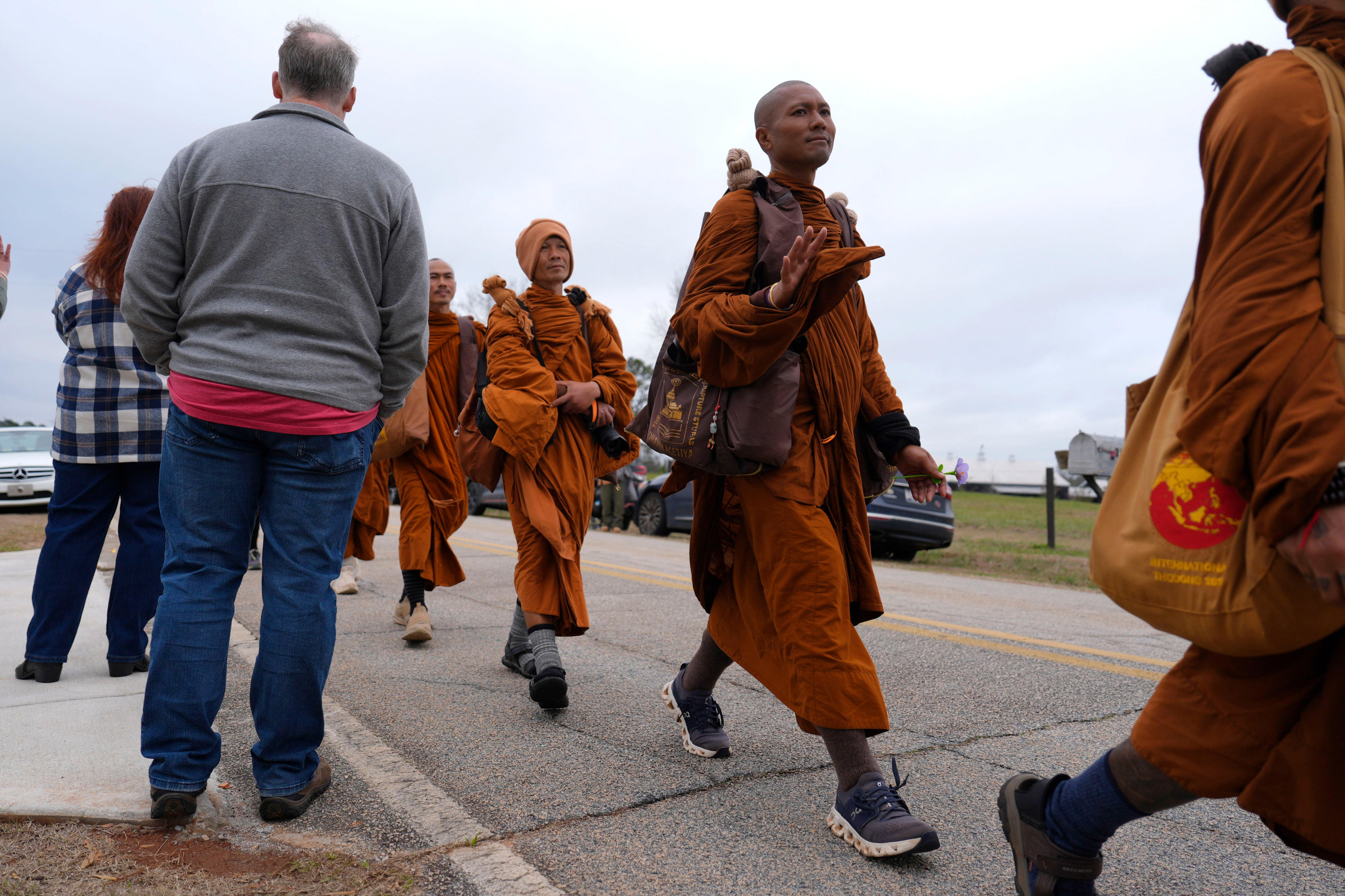 When will the Buddhist monks walk for peace arrive in North Carolina?