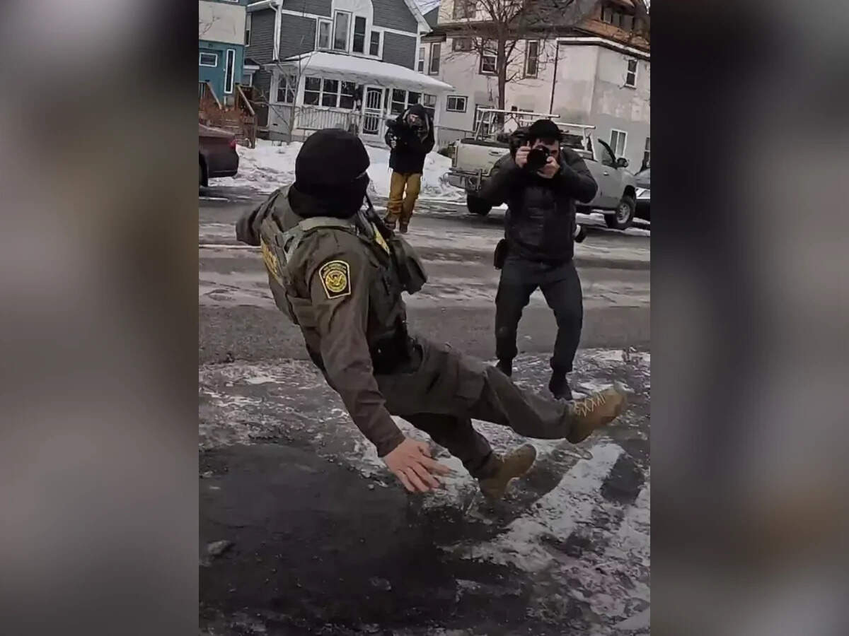 ICE officer slips on ice during protest, viral video sparks online ...