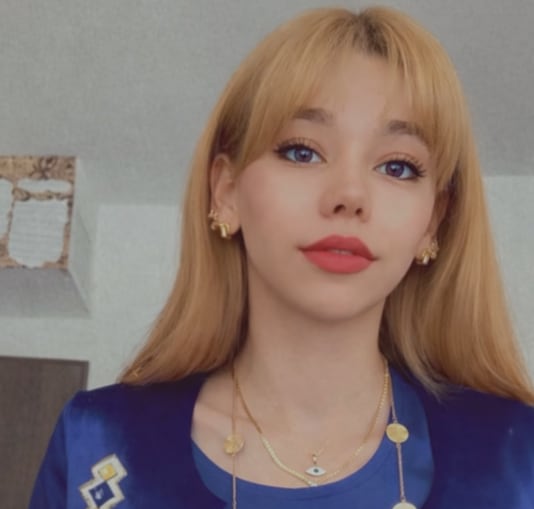 Fashion student Robina Aminian 'shot in the head' in Tehran protests