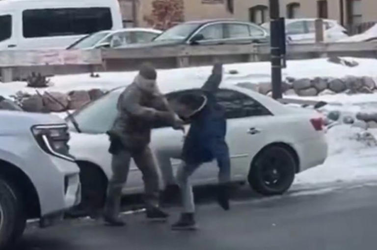 Shocking moment ICE agent shoves man to the ground on Minneapolis street