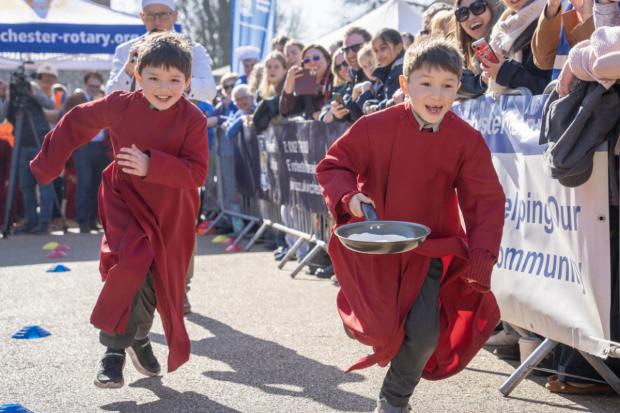 Fancy dress and pancake flipping at charity fun races in Winchester