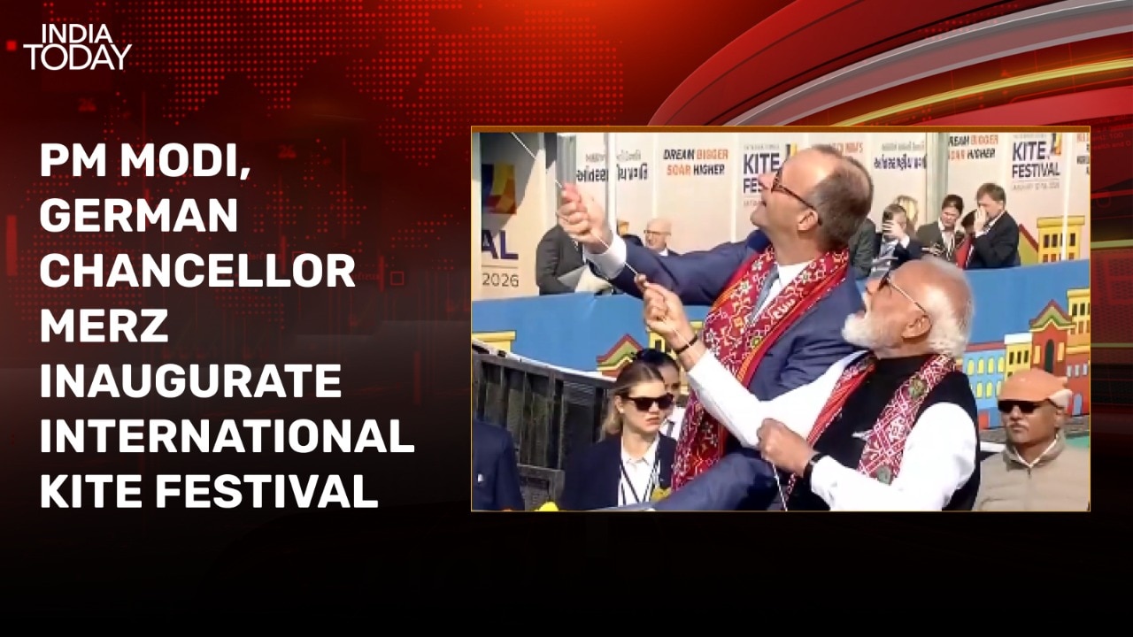 PM Modi, German chancellor fly kite at International Kite Festival in ...