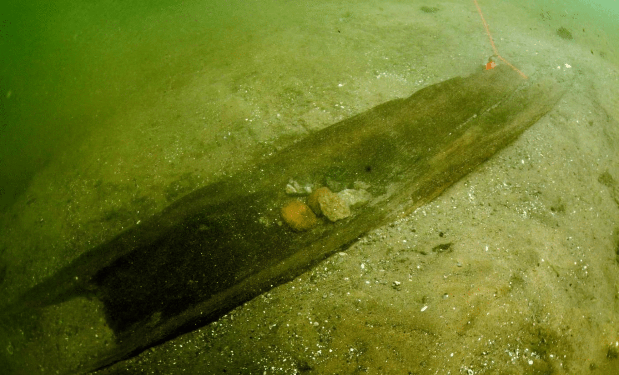 Archaeologists unearth 5,200-year-old canoes in Wisconsin, older than ...