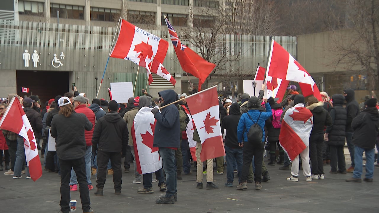 8 charged after after anti-immigration rally and counter-protest