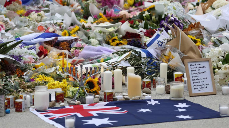 ‘Light will win’: National day of mourning