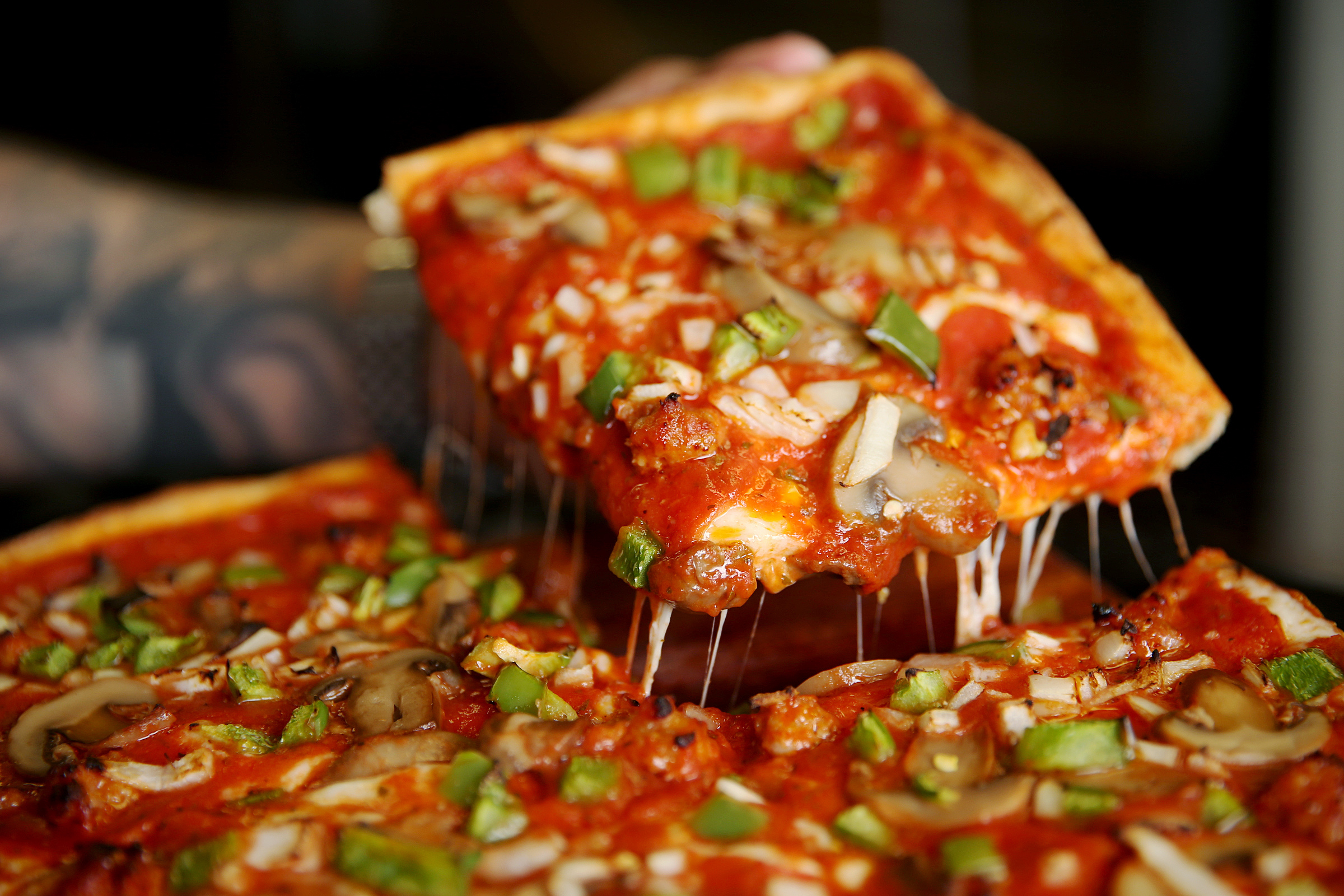 An owner of Santucci’s Original Square Pizza was ordered to serve one ...