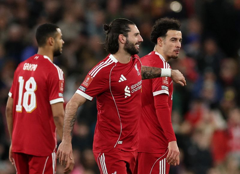 Soccer-Liverpool beat Barnsley 4-1 to reach FA Cup fourth round