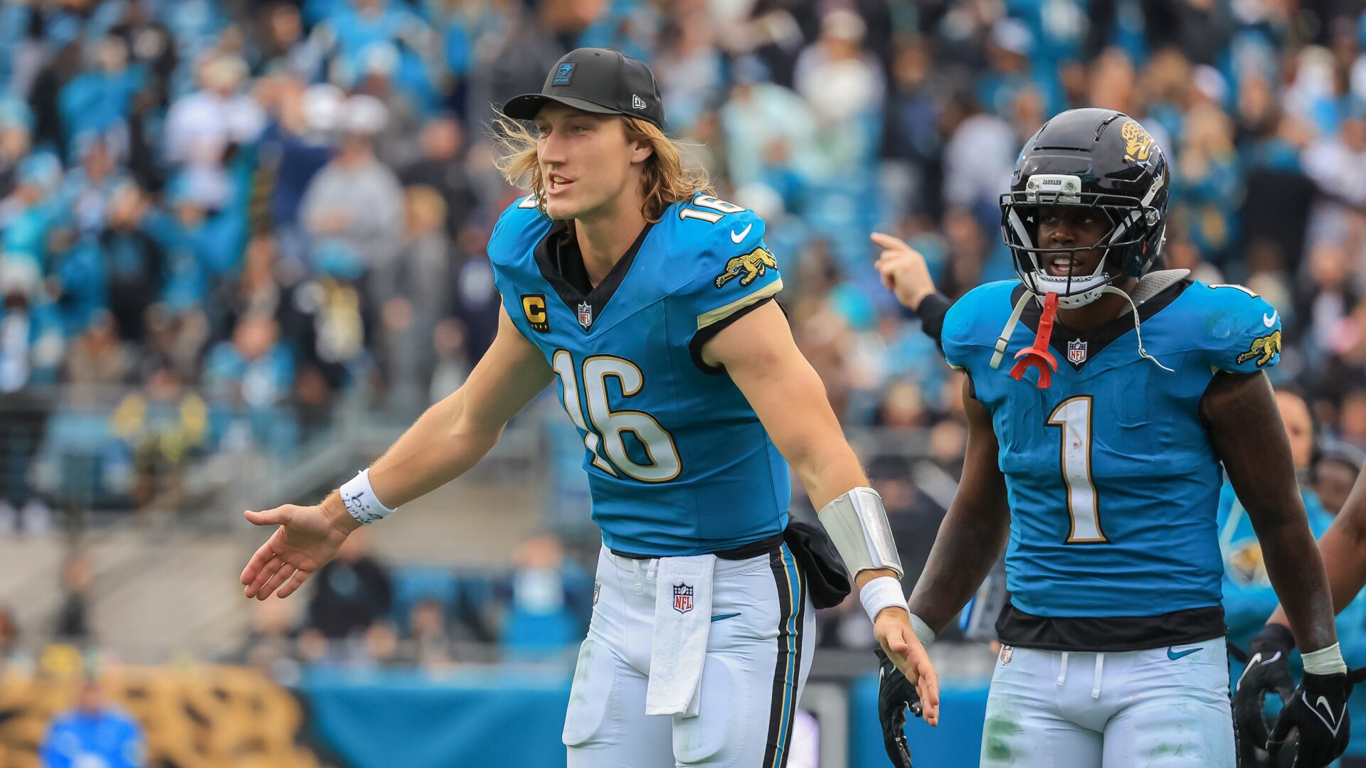 Travis Etienne wants to see Trevor Lawrence "just be cocky, stop caring ...