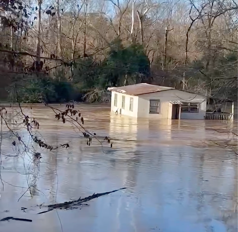 Flooded river in Mississippi washes a house away. See video