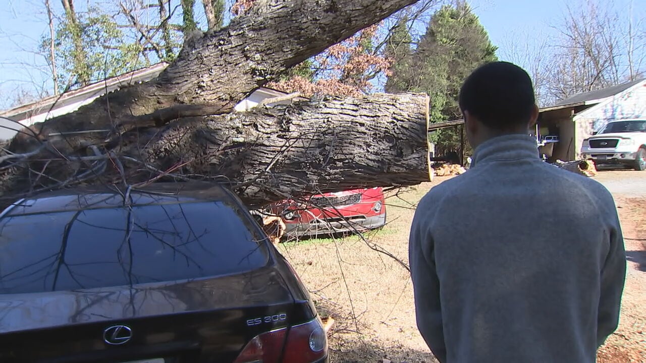 Strong winds cause tree to crush car, damage home in Catawba County