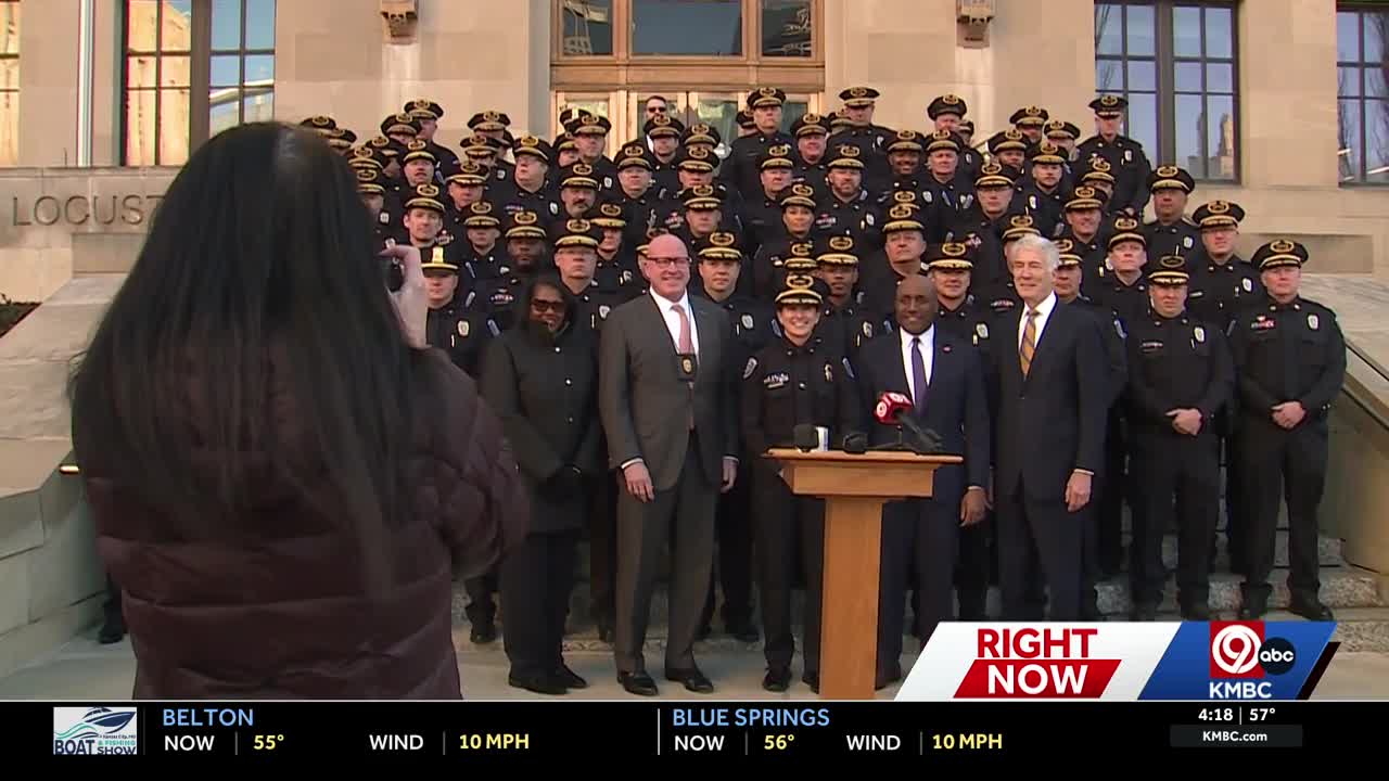 Kansas City police officers debut new navy blue uniforms