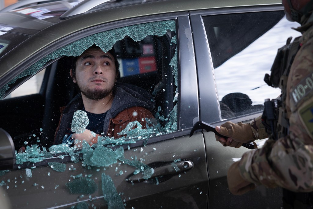 ICE agents smash car window, detain man in Minnesota