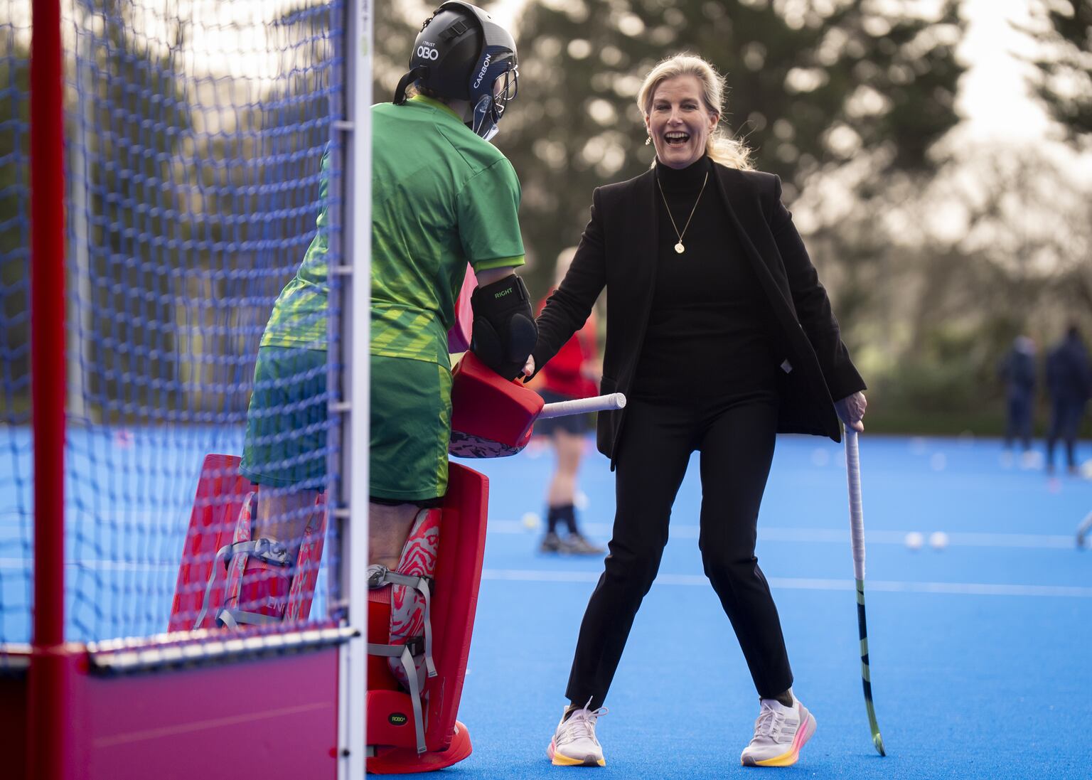 Sophie takes a shot at goal as she shows off hockey skills