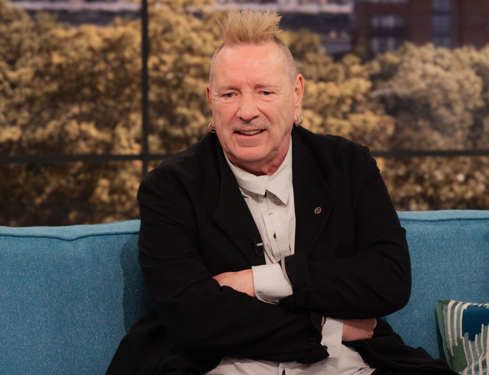 Johnny Rotten's yak costume struggles on Masked Singer