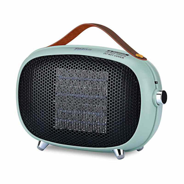 This retro-inspired mini space heater turns any room into a cozy winter ...