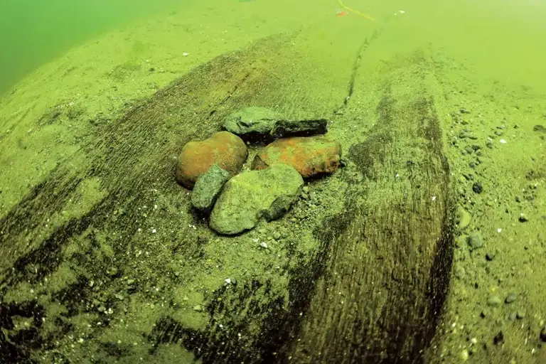 Archaeologists unearth 5,200-year-old canoes in Wisconsin, older than ...