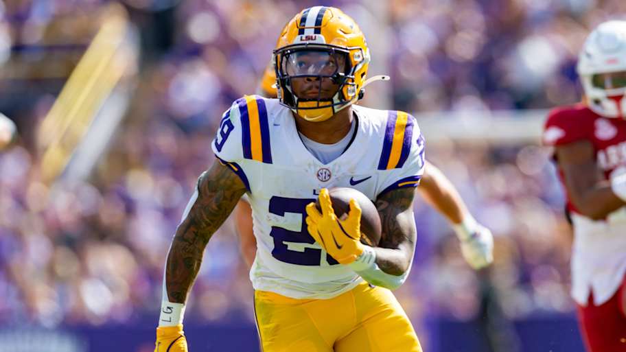 Prized LSU football running back returning to the Tigers, withdraws ...