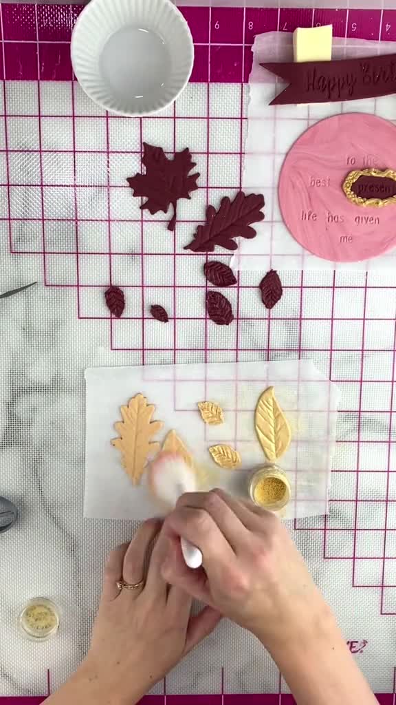 Easy fondant autumn leaves with a rich gold finish