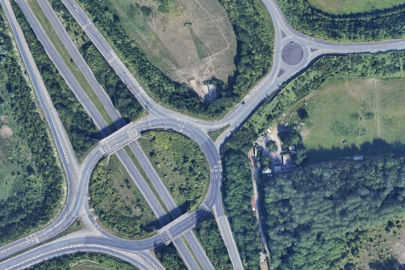 'Avoid area' warning as fire crews tackle chemical spill on major road