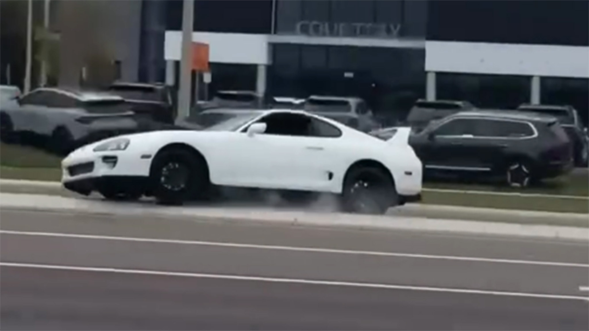Toyota Supra Mk4 hits another Toyota, then a Toyota dealer