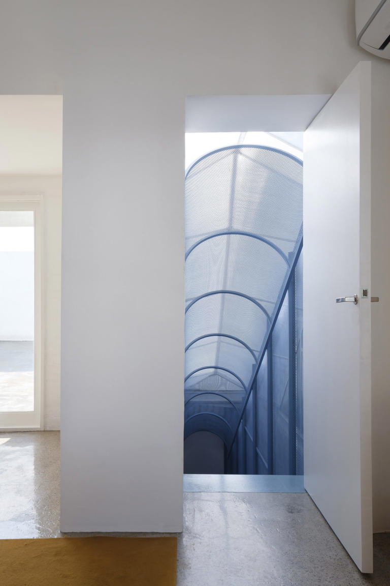 Mesh-covered Buenos Aires wine shop designed to resonate with the city ...