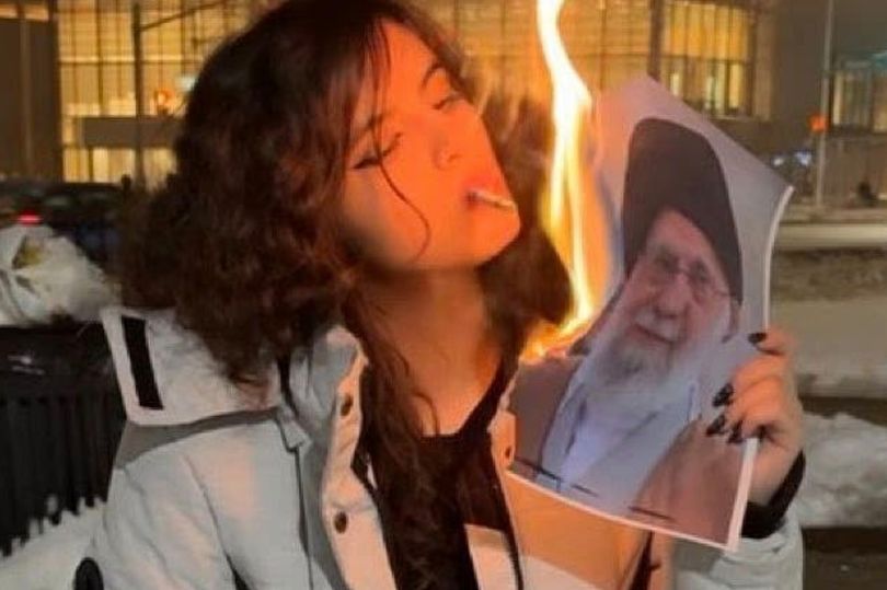 Iranian women risk prison as they smoke and burn photos of Ayatollah ...