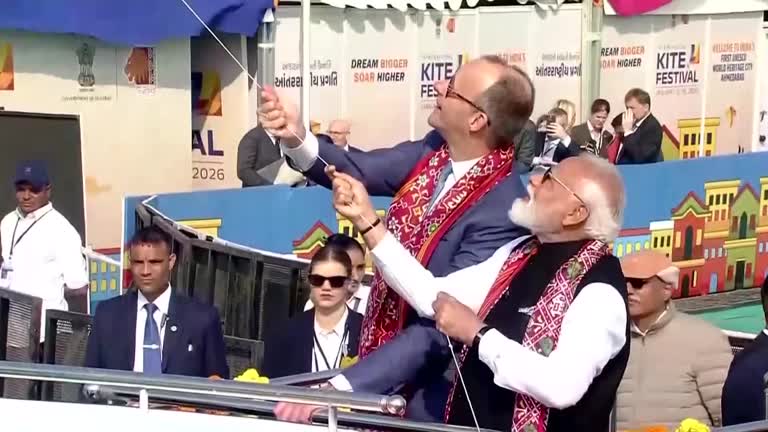 Germany's Merz flies kites with Modi in India