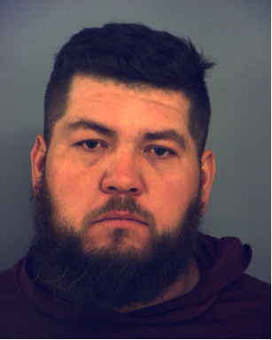 Man arrested for illegal dumping after getting stuck while trying to leave