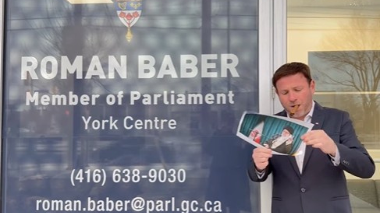 Canada MP joins viral Iran protest trend, lights cigar with burning ...