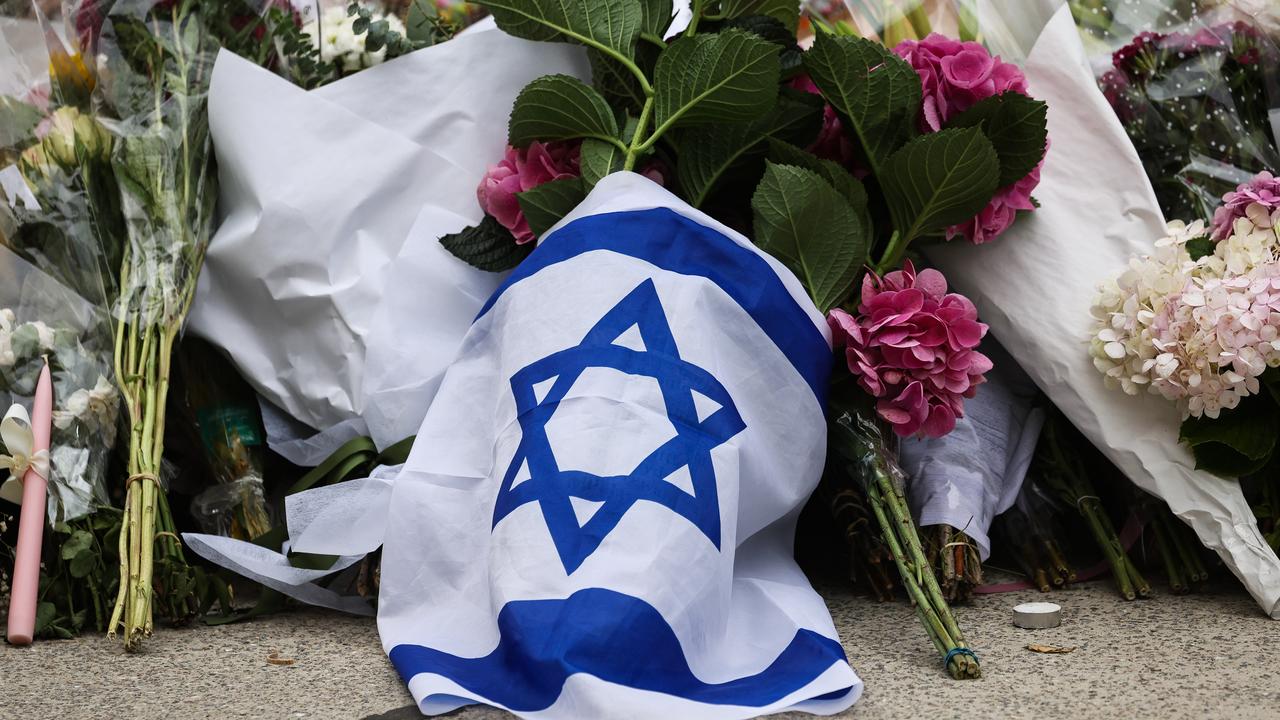 ‘Light will win’: National day of mourning