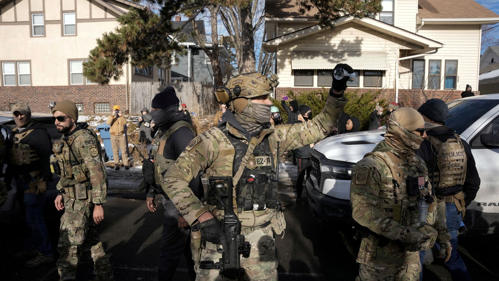 Hundreds more officers heading to Minnesota - as state sues Trump ...