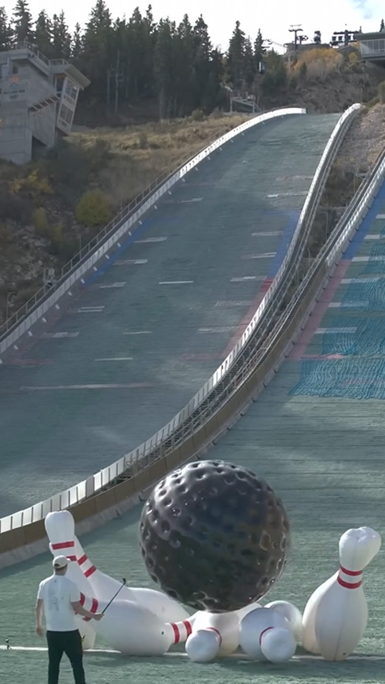 Dropping a giant bowling ball down a ski jump